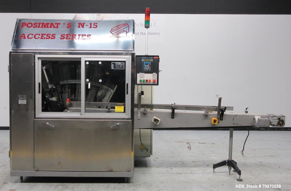 Used Posimat N15 Rotary Bottle Unscrambler. Includes an elevator. Now