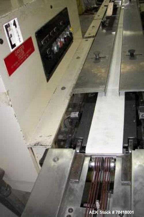 UsedDoboy Model J Wrapper with incline product feeder. Servo driven s