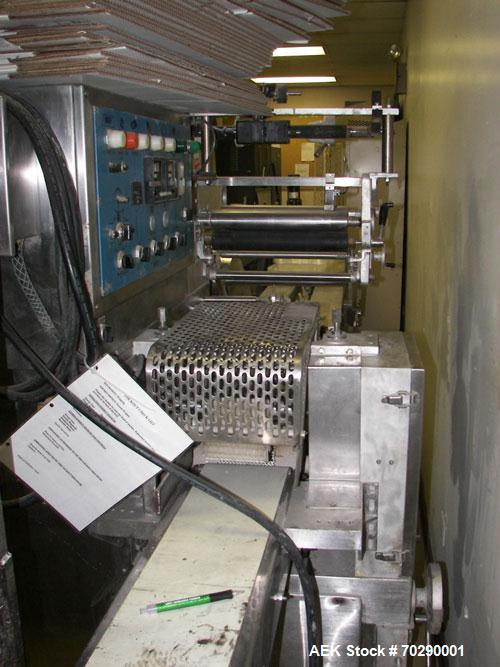 Used Fuji Formost FW370 Horizontal Wrapper. Machine is a 1 up unit an