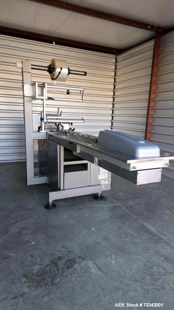 Used PFM Horizontal Flow Wrapper, Model Hawk. Rated up to 120 packs/m