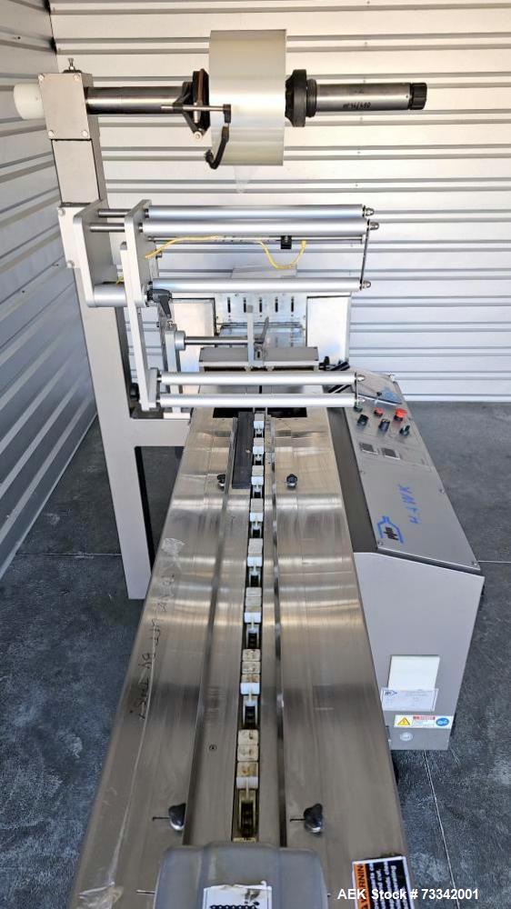 Used PFM Horizontal Flow Wrapper, Model Hawk. Rated up to 120 packs/m