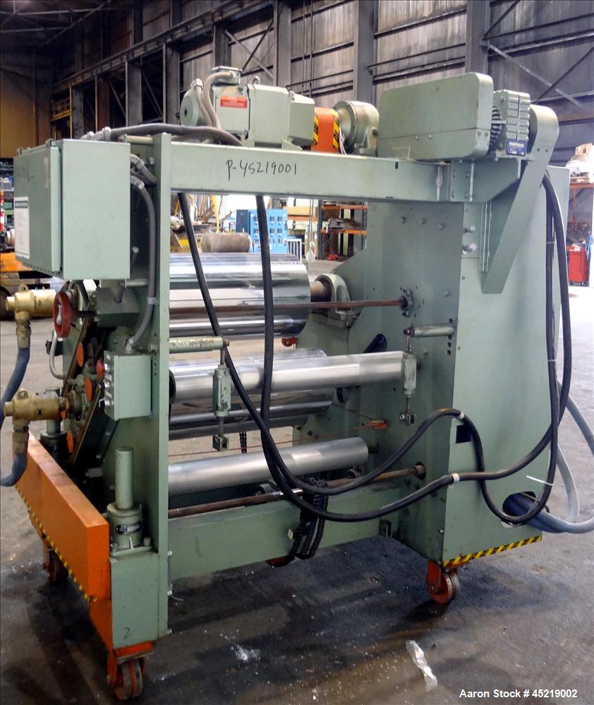 Used Davis Standard (2) Roll Casting Stand. (2) Approximate 18" Diame