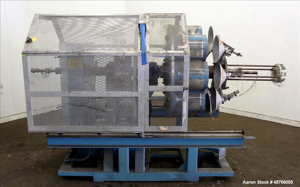 Used Hose Reinforcement Unwinder. (8) Rotating stations driven by a 5