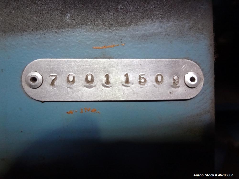 Used Hose Reinforcement Unwinder. (8) Rotating stations driven by a 5