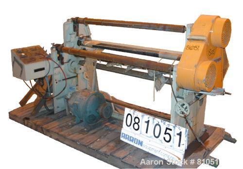 USED: Cameron slitter, model T554-8. 63" wide rolls. 5 hp motor.
