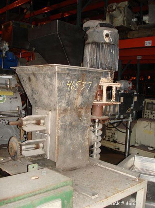 Used Feco Briquetter/Compactor. 4" x 8". Chrome plated. 1/2" wide x 4