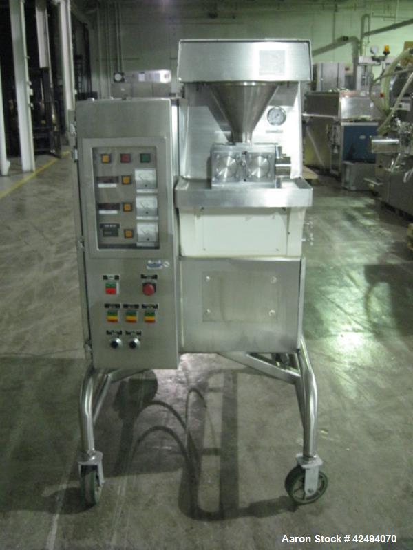 Used Vector roller compactor, model TF-MINI, stainless steel product