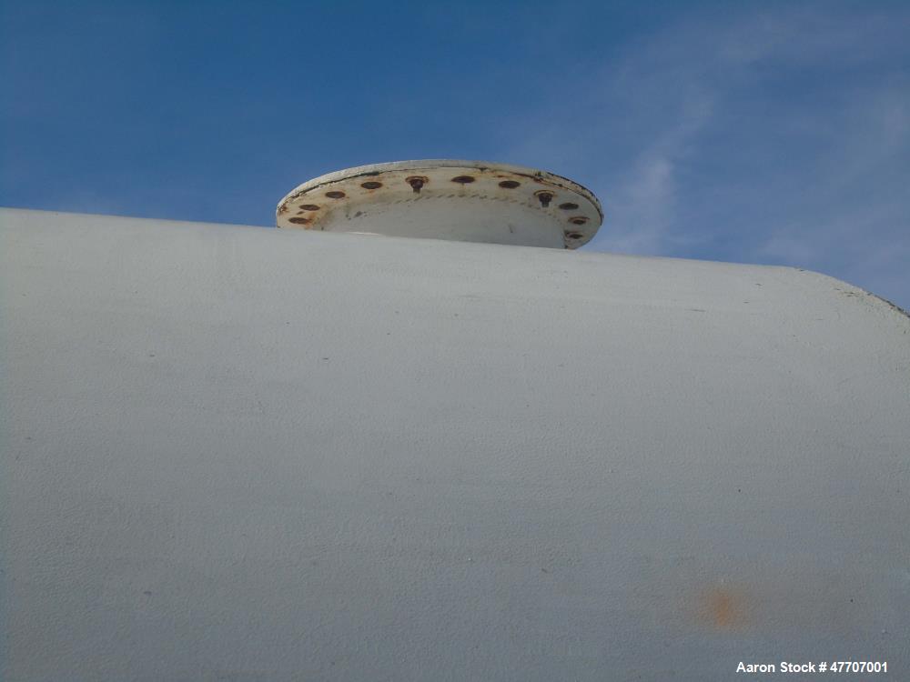 Used 20,000 Gallon Upright Surface Tank. Carbon steel, 32' high x 10'